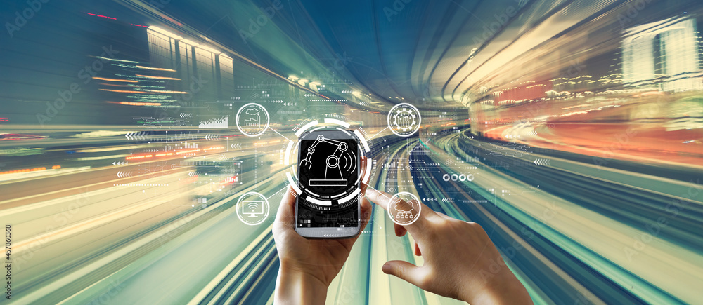 Smart industry concept with person using a smartphone over abstract ...