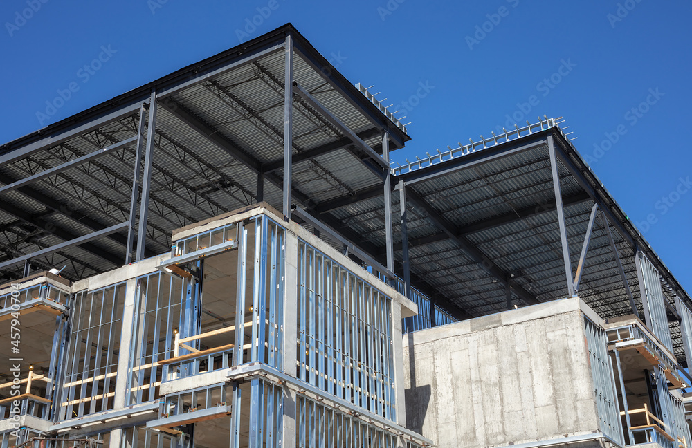 building construction site metal structure frame concrete office tower ...