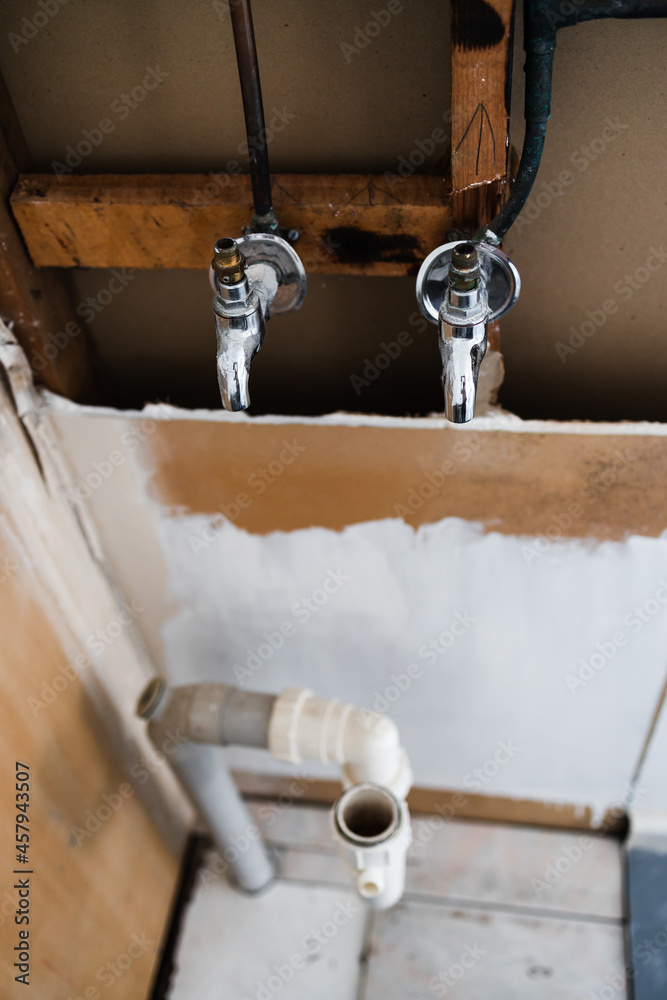 laundry room renovation with plaser walls interior exposed with taps ...
