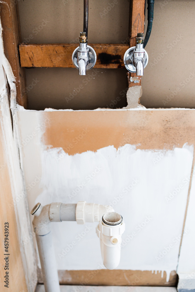 laundry room renovation with plaser walls interior exposed with taps ...