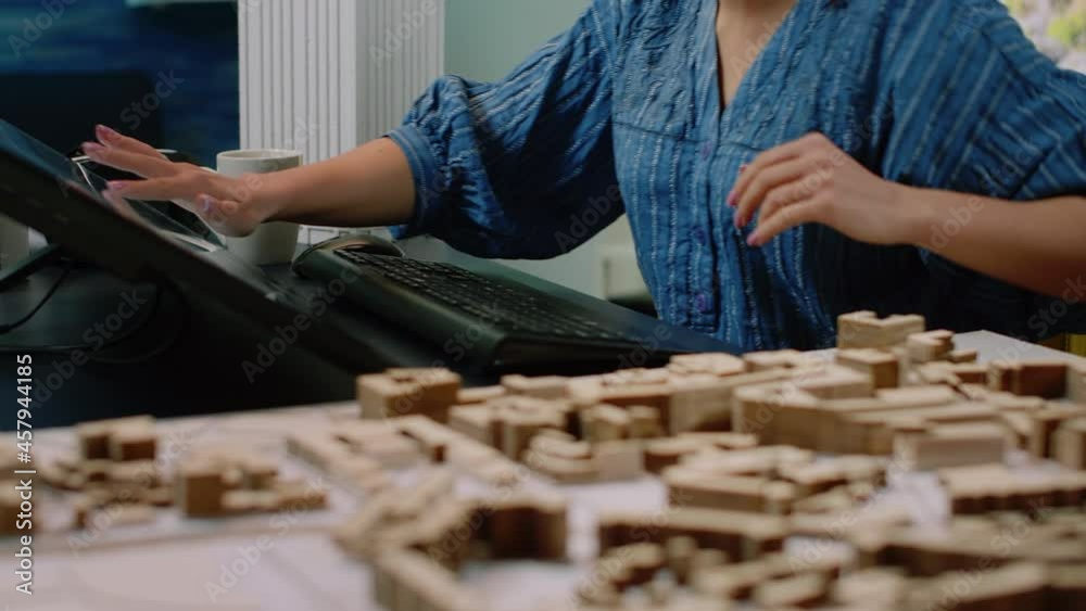 Vidéo Stock Close up of architectural desk with building model and ...
