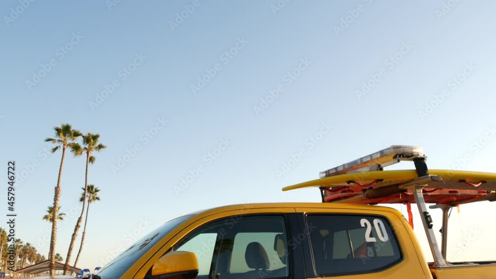 Yellow lifeguard car, Oceanside beach, California USA. Coastline rescue ...