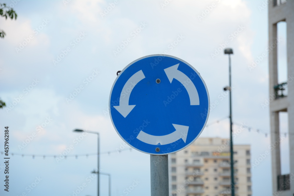 Traffic sign: "Roundabout" .Signs giving orders. Road signs in Israel ...