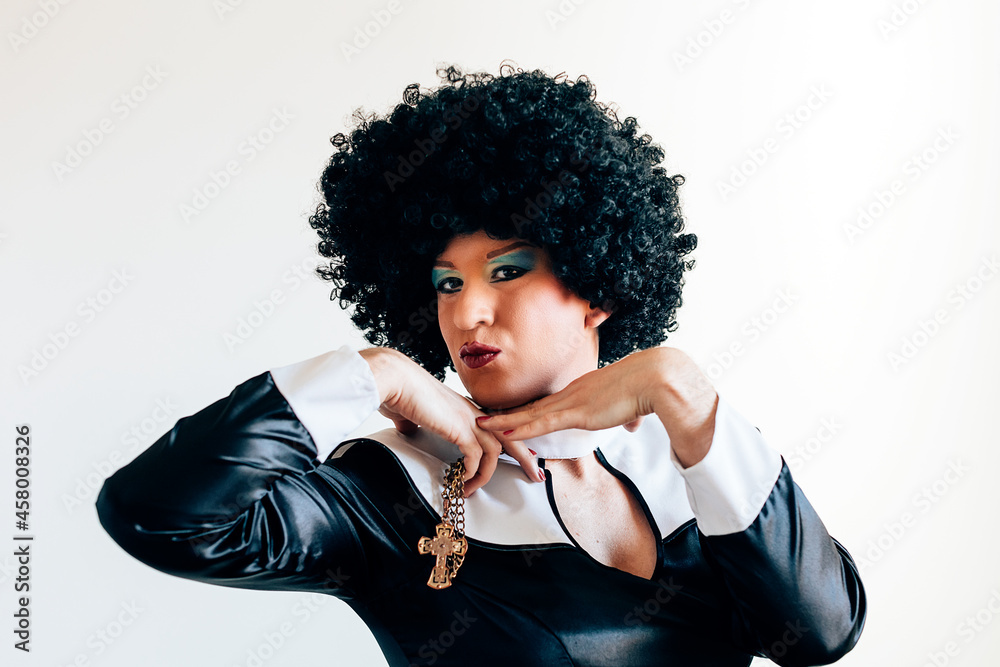 portrait of a non-binary person - drag queen performing a provocative ...