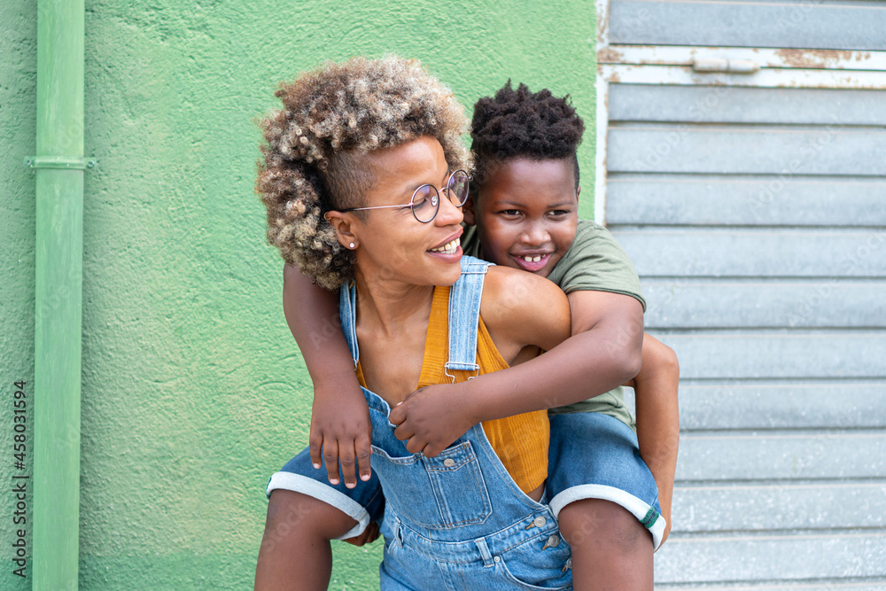 Black family of a single mother and her son. Casual Portrait of young ...
