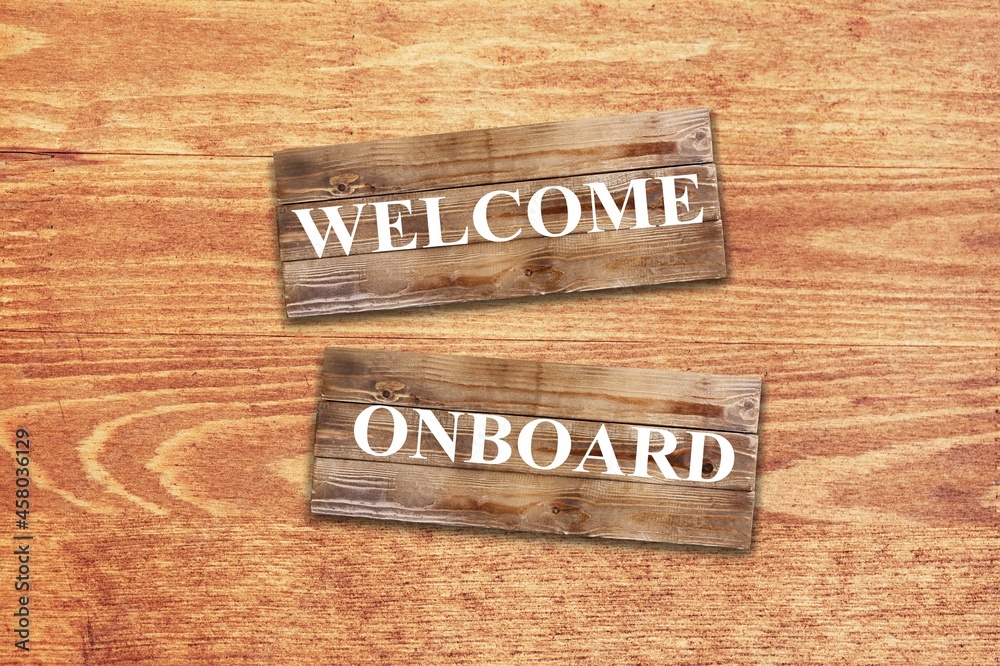 Welcome onboard symbol. Wooden blocks with words on a beautiful ...