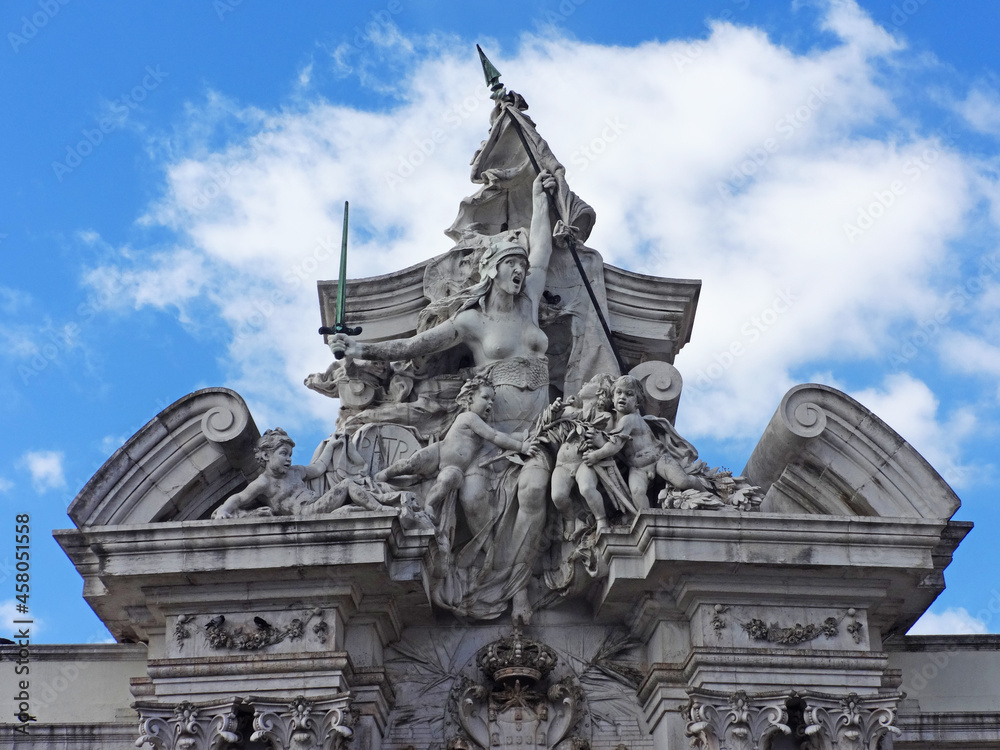 the statue of a warrior woman with sword and spear in the gateway ...