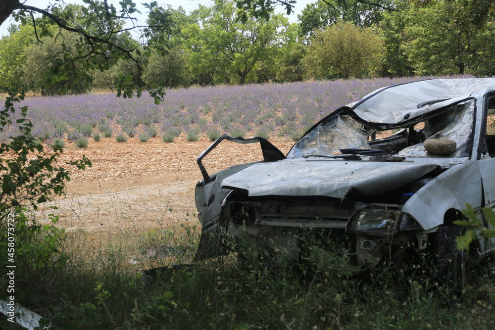 destroyed abandoned car after a road accident Stock Photo | Adobe Stock