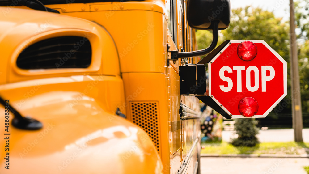 Yellow school bus. Stop sign. Be careful, schoolchildren crossing the ...