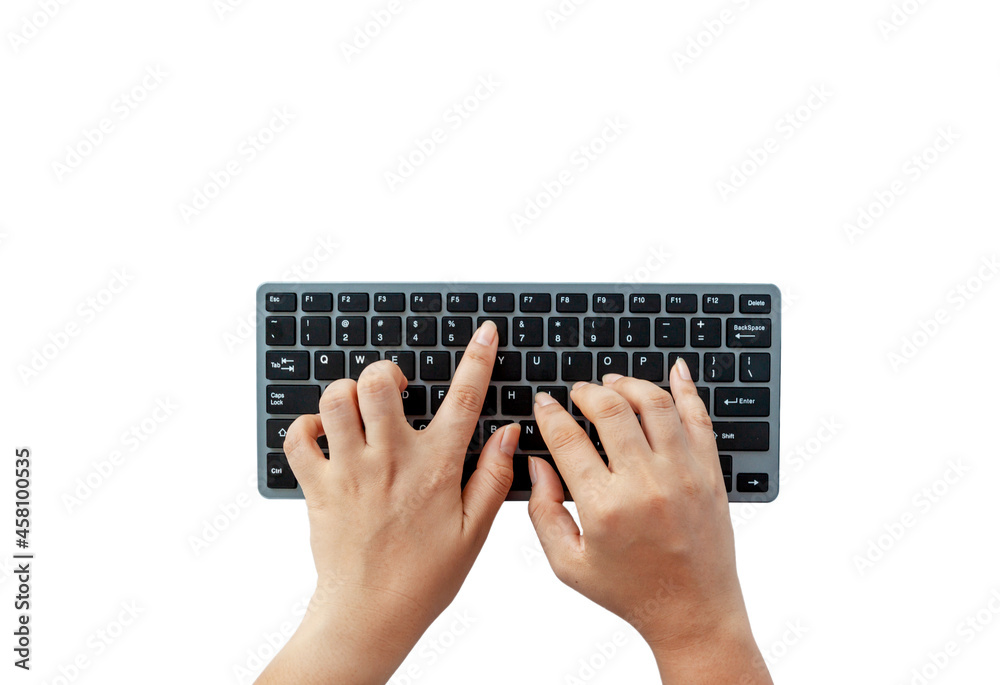From the top, female hands on a modern computer keyboard. Isolated on a ...