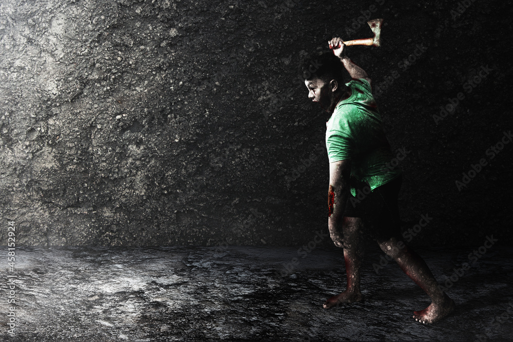 Scary zombie with blood and wound on his body holding ax standing Stock ...