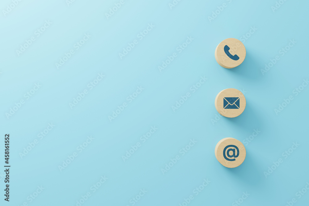 Wooden block with symbol telephone, email, address. Website page ...
