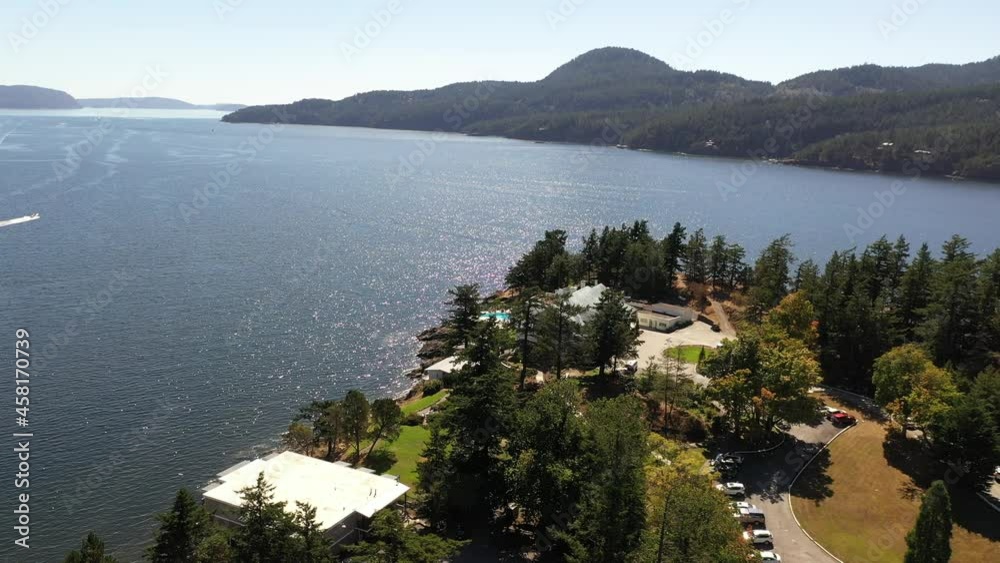 Cinematic 4K aerial drone orbiting footage of Rosario Point, Cascade Bay, East Sound, Rosario ...
