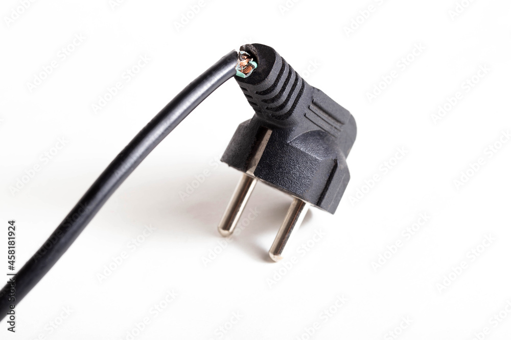 Broken electrical wire with a plug on a white background, isolate ...