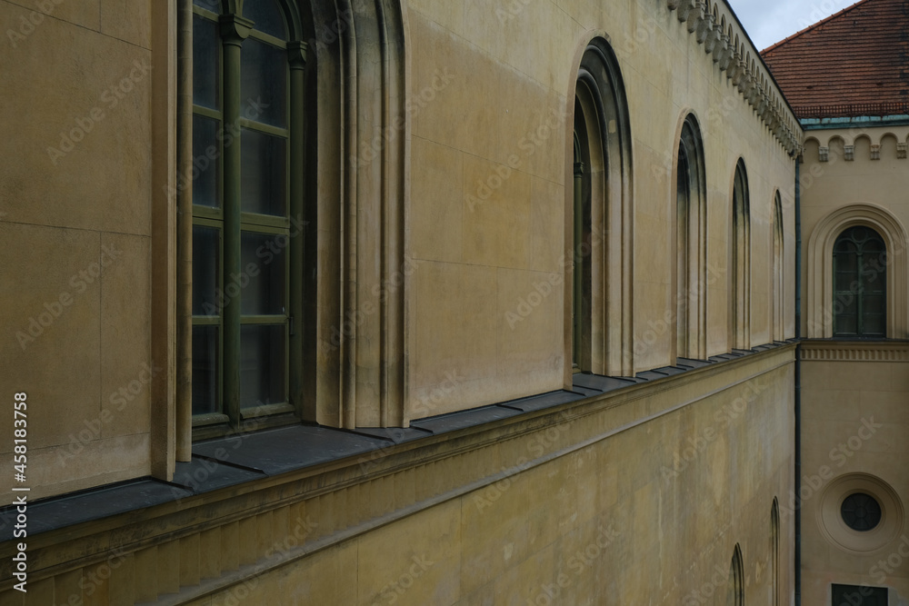 Windows inside historic classic old building house palace with archways ...
