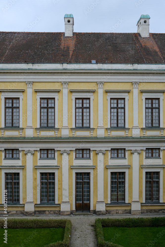 Windows inside historic classic old building house palace with archways ...