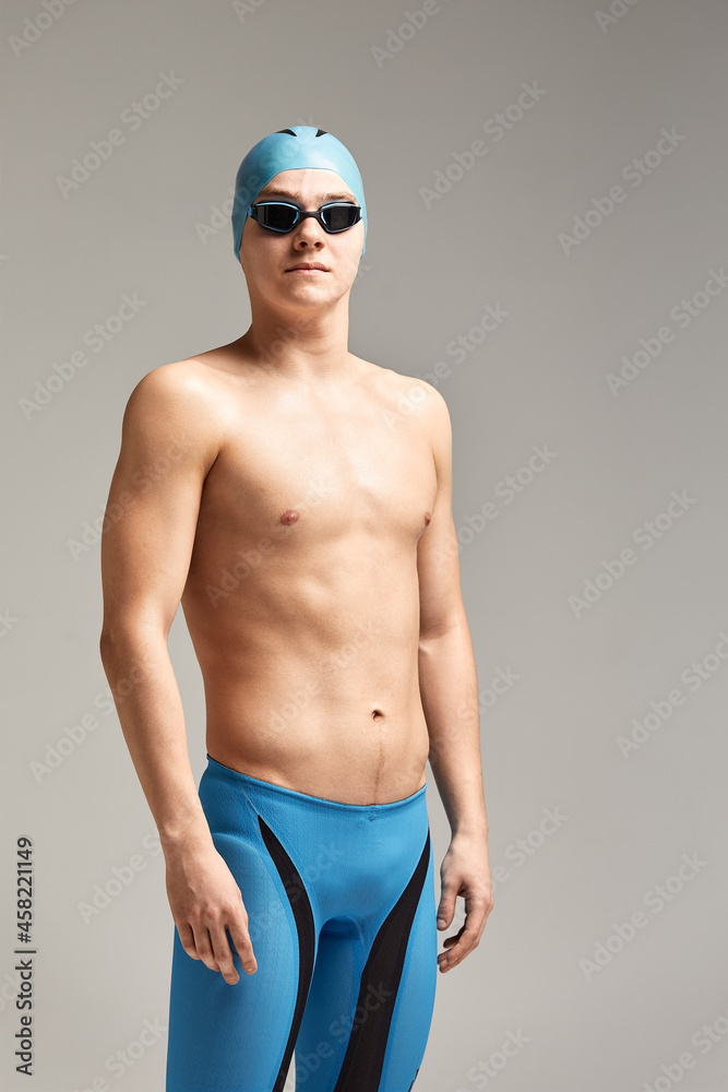 Portrait of a swimmer in a cap and mask, half-length portrait, young ...