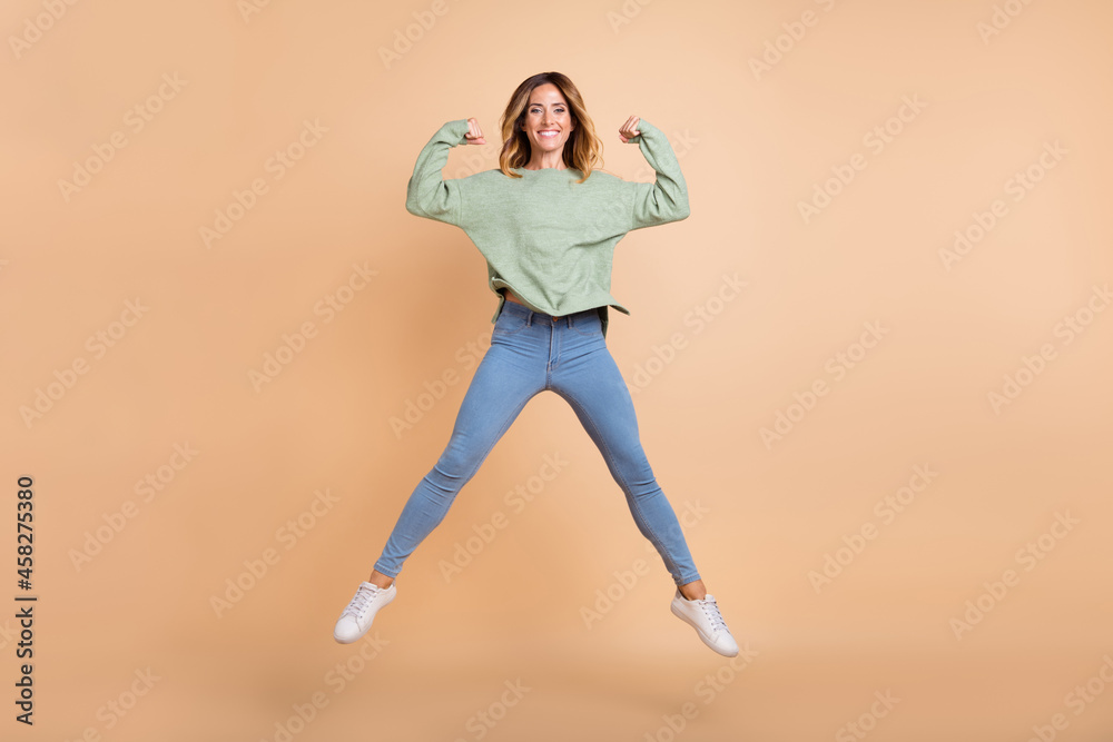 Full length body size view of lovely cheerful woman jumping showing ...