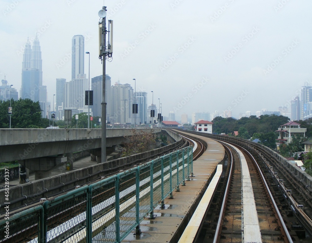 train track and transmission towerat malaysia background petronas twin ...