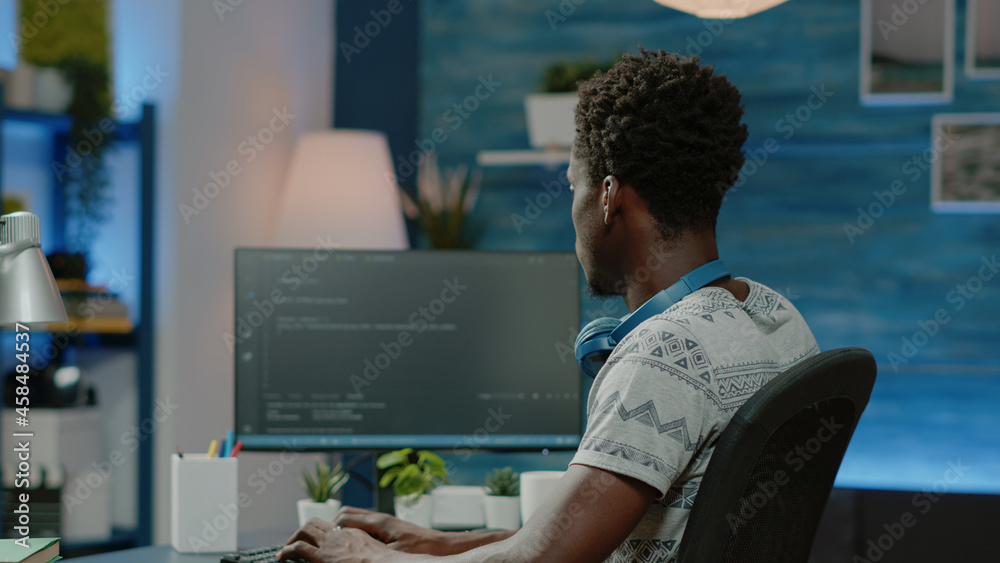 Person programming website firewall with codes on computer. Programmer ...