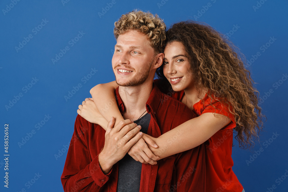 Young white couple hugging and laughing together Stock Photo | Adobe Stock
