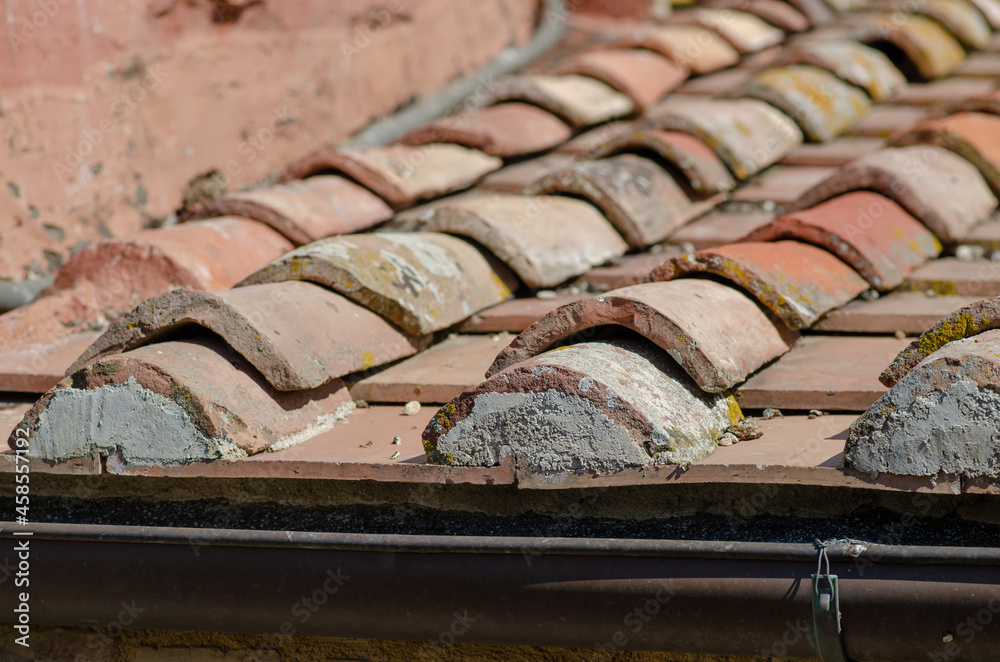 House: building with pitched roof with clay tiles and tiles, visible ...