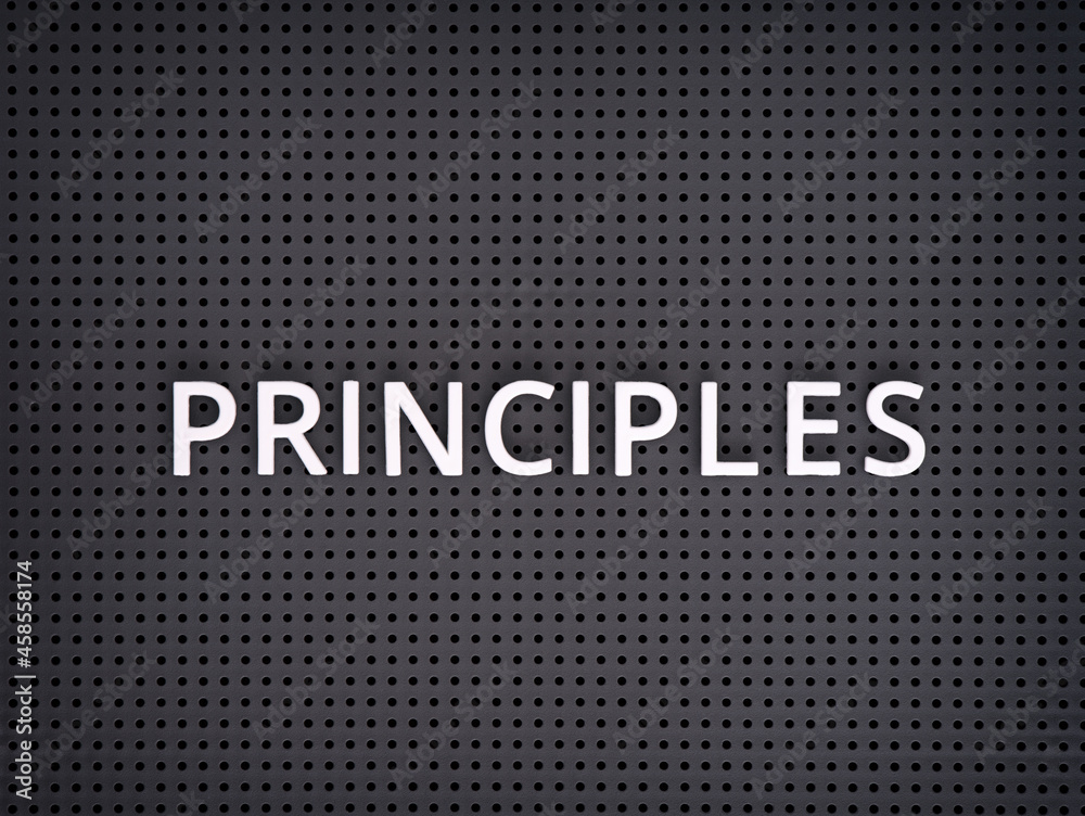 Word Principles spelled out with white letters on gray pegboard Stock ...
