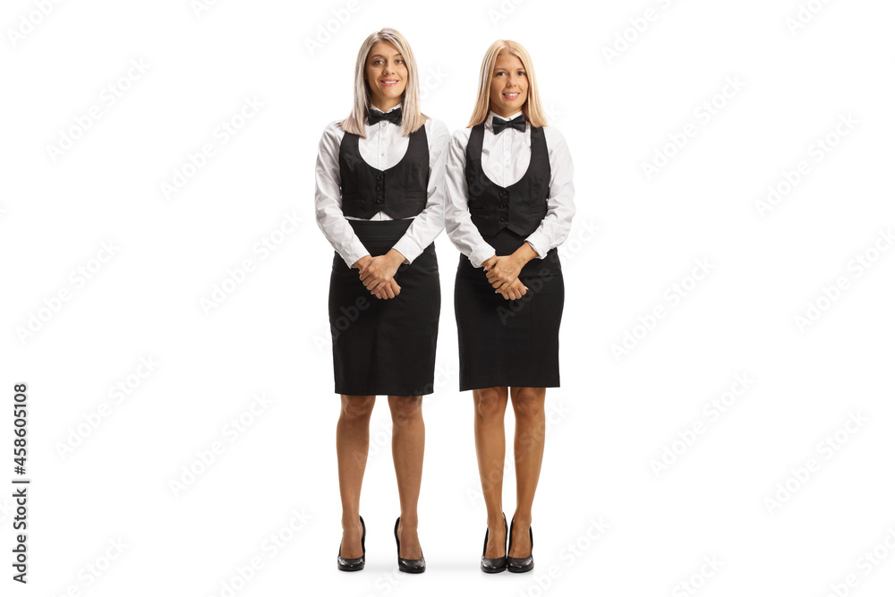 Two female waitresses in uniforms posing Photos | Adobe Stock