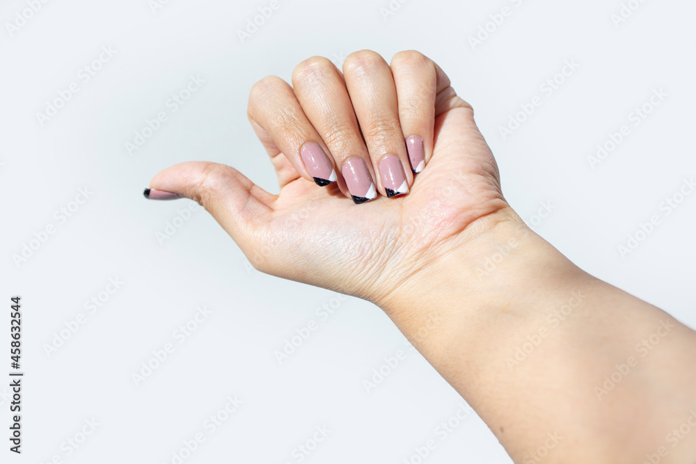 MANO DE MUJER CERRADA CON PULGAR EXTENDIDO Y DEDOS DOBLADOS CON ...