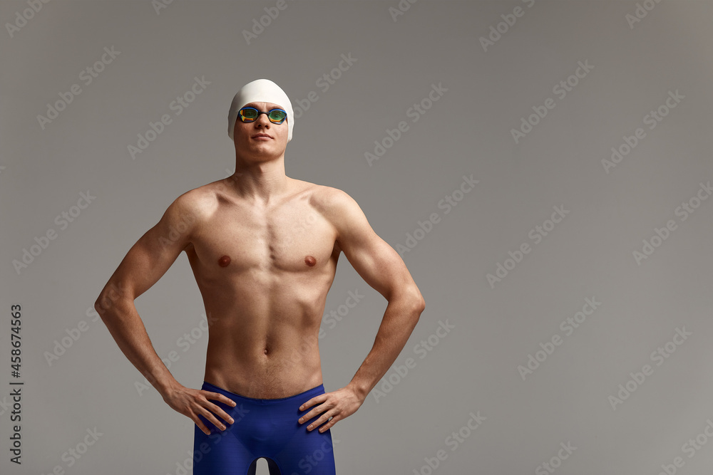 Portrait of a swimmer in a cap and mask, half-length portrait, young ...