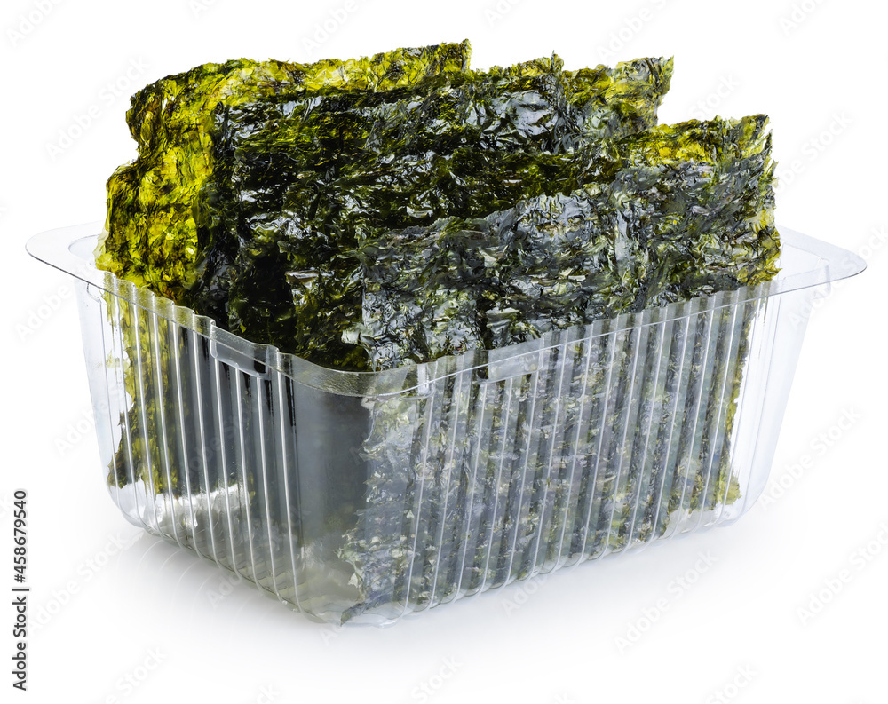 Crispy nori seaweed korean snack in a plastic container isolated on ...