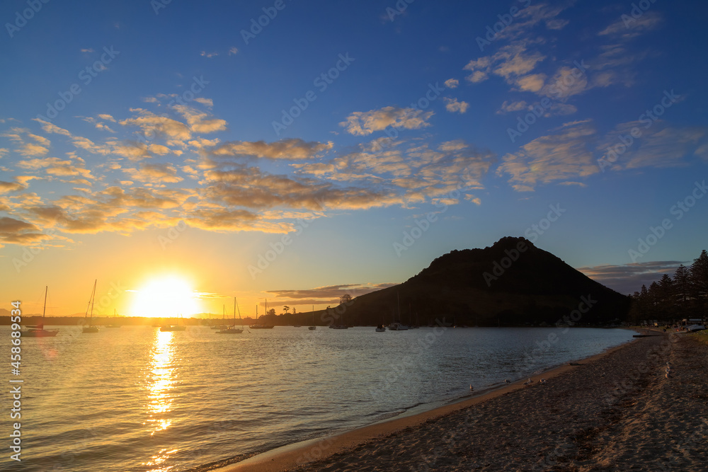 Mount Maunganui, New Zealand. Sunset over Pilot Bay Beach and Tauranga ...