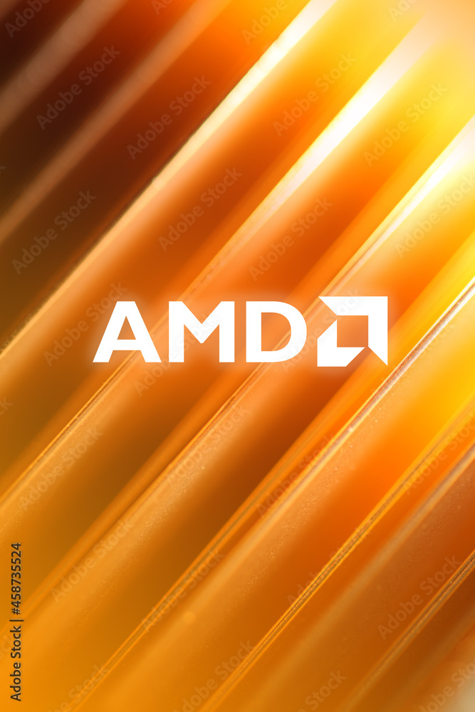AMD logo on shiny hot computer processor chip copper cooler abstract ...