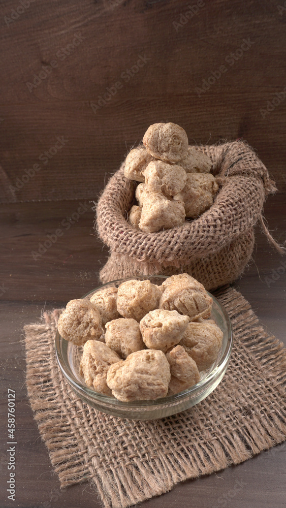Raw soya chunks on dark background. Healthy, nutritious soybean meat ...