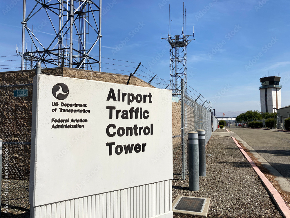 Airport Traffic Control Tower sign. The tower is managed by the Federal ...