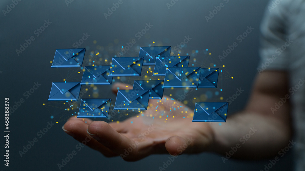 Hand holding using mobile phone with email icon on screen. Concept of ...