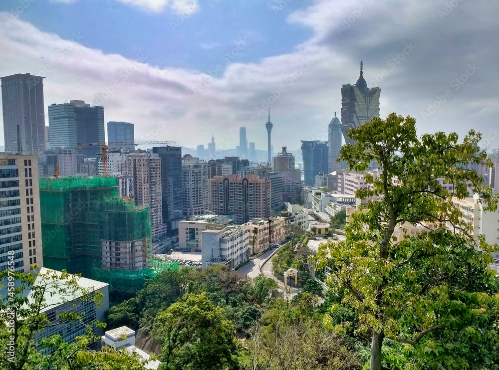 Grand Lisboa and Macau Tower. View of residential buildings in Macao ...