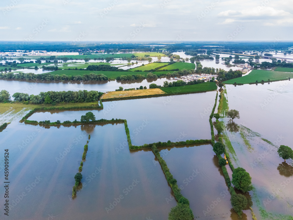 Aerial view of flooded farmland during a high water period in summer on ...