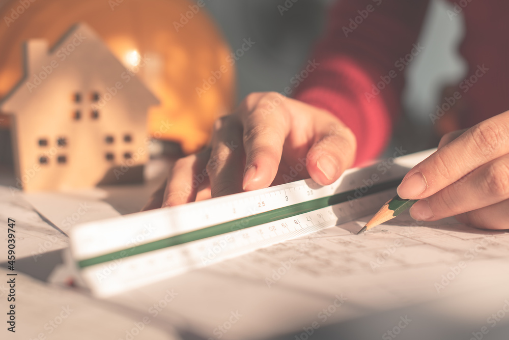 Architect working on blueprint. Architects workplace - architectural ...
