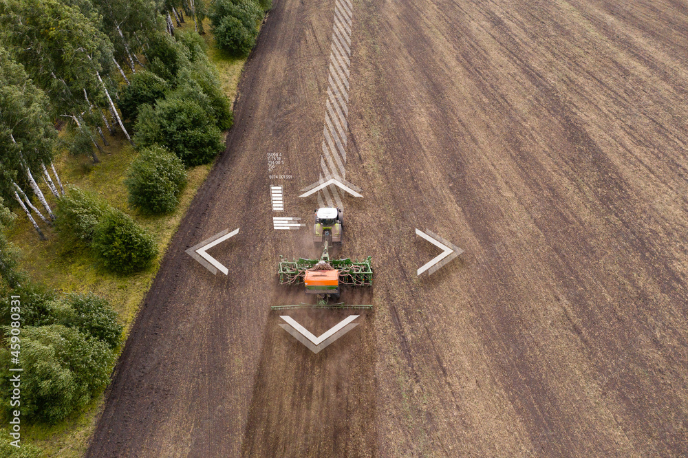 Autonomous tractor on the field. Digital transformation in agriculture ...