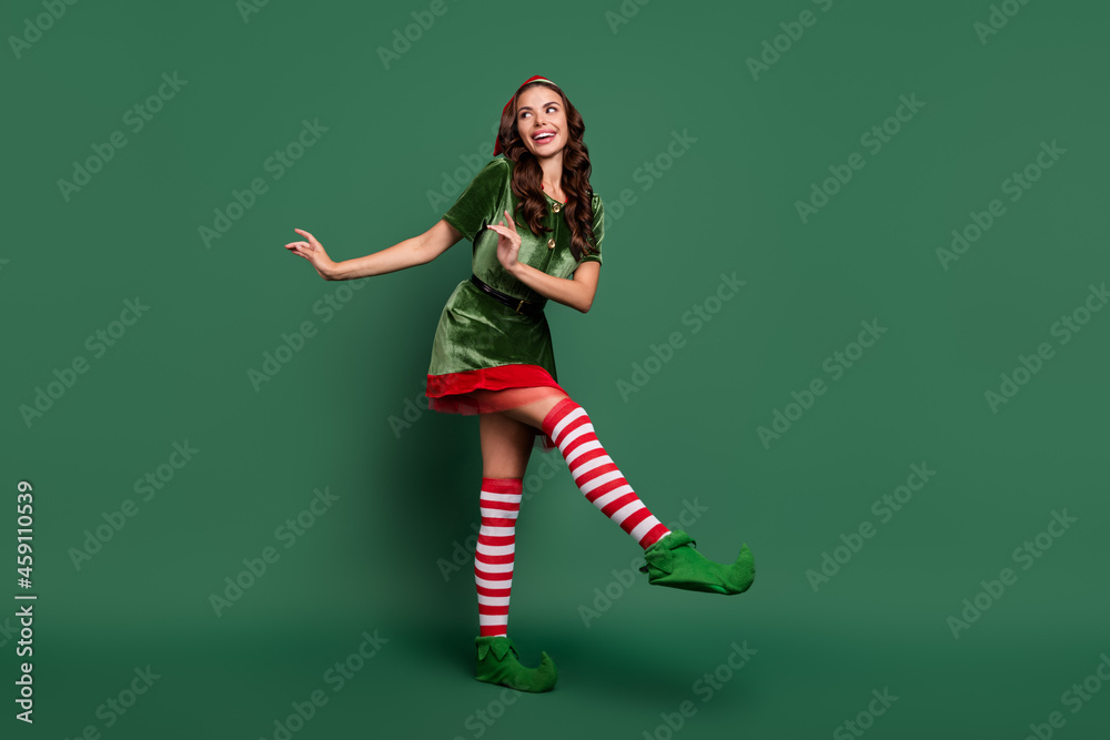 Full length body size view of attractive cheerful girl elf dancing ...