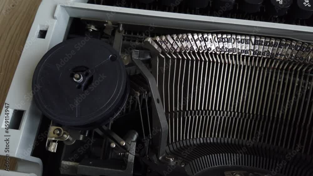 Mechanism of a retro typewriter. Old typewriter hammers. Close up ...