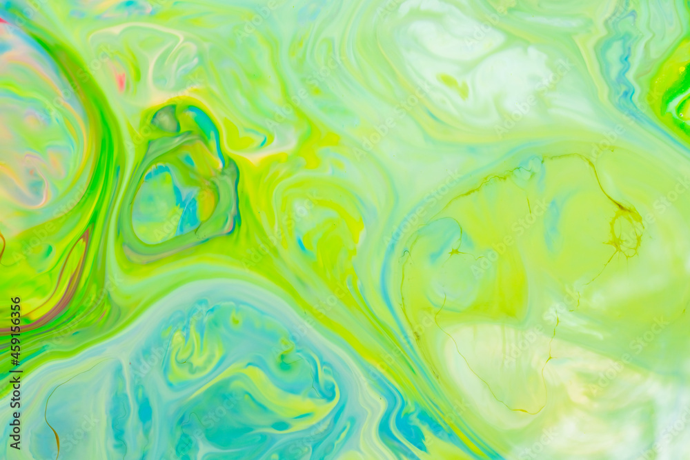 Green fluid art background. Liquid abstract pattern with UFO green ...