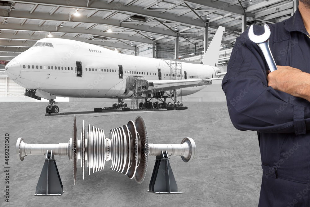Engineer maintenance an airplane are performing repairs, fixes ...