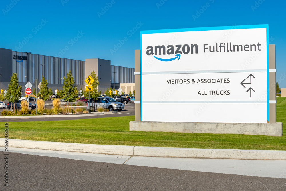 General view of the welcome sign and building of the Amazon Fulfillment ...