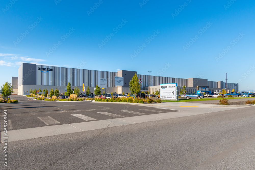 General view of the welcome sign and building of the Amazon Fulfillment ...