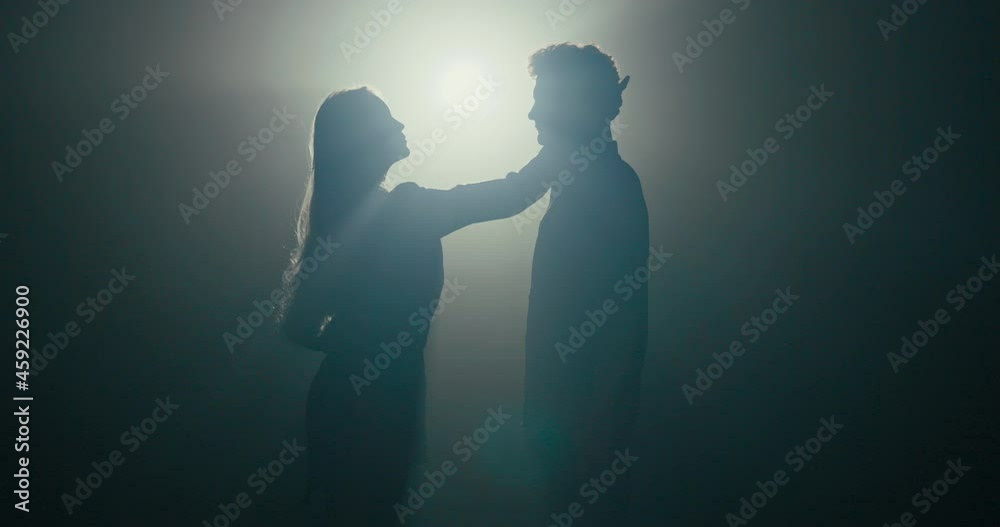 Shot of couple in love standing close together beautiful blonde puts ...
