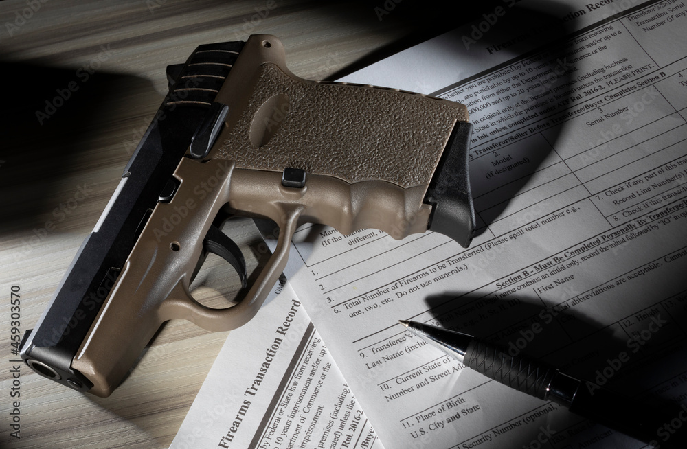 Tan polymer semi auto handgun on the FBI NICS background check forms in ...