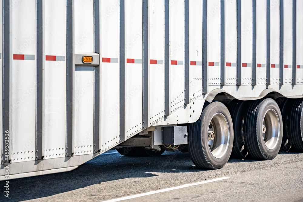 Heavy-duty bulk semi trailer with stiffening rib and three axes running ...