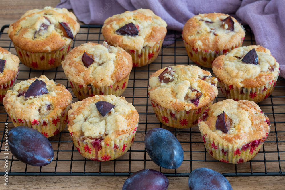cake rack with plum muffins Stock Photo | Adobe Stock